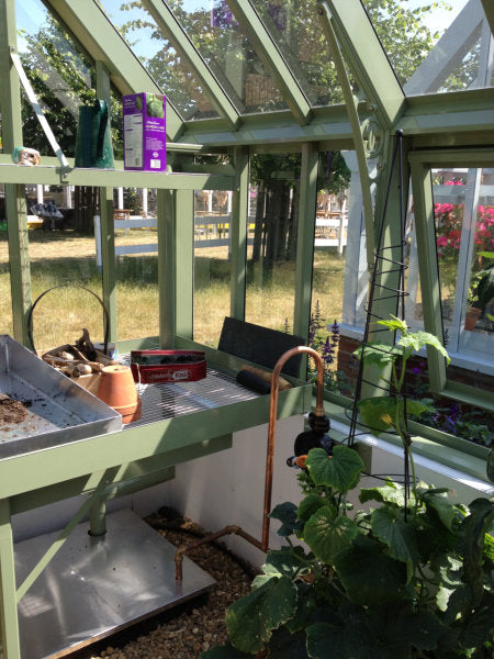 Internal water storage tank with hand pump (225 gallon) - greenhouse ...